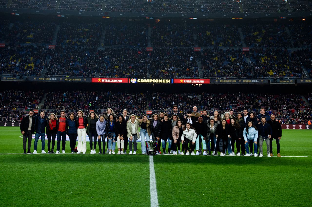 Women's football and basketball teams parade trophies at Camp Nou