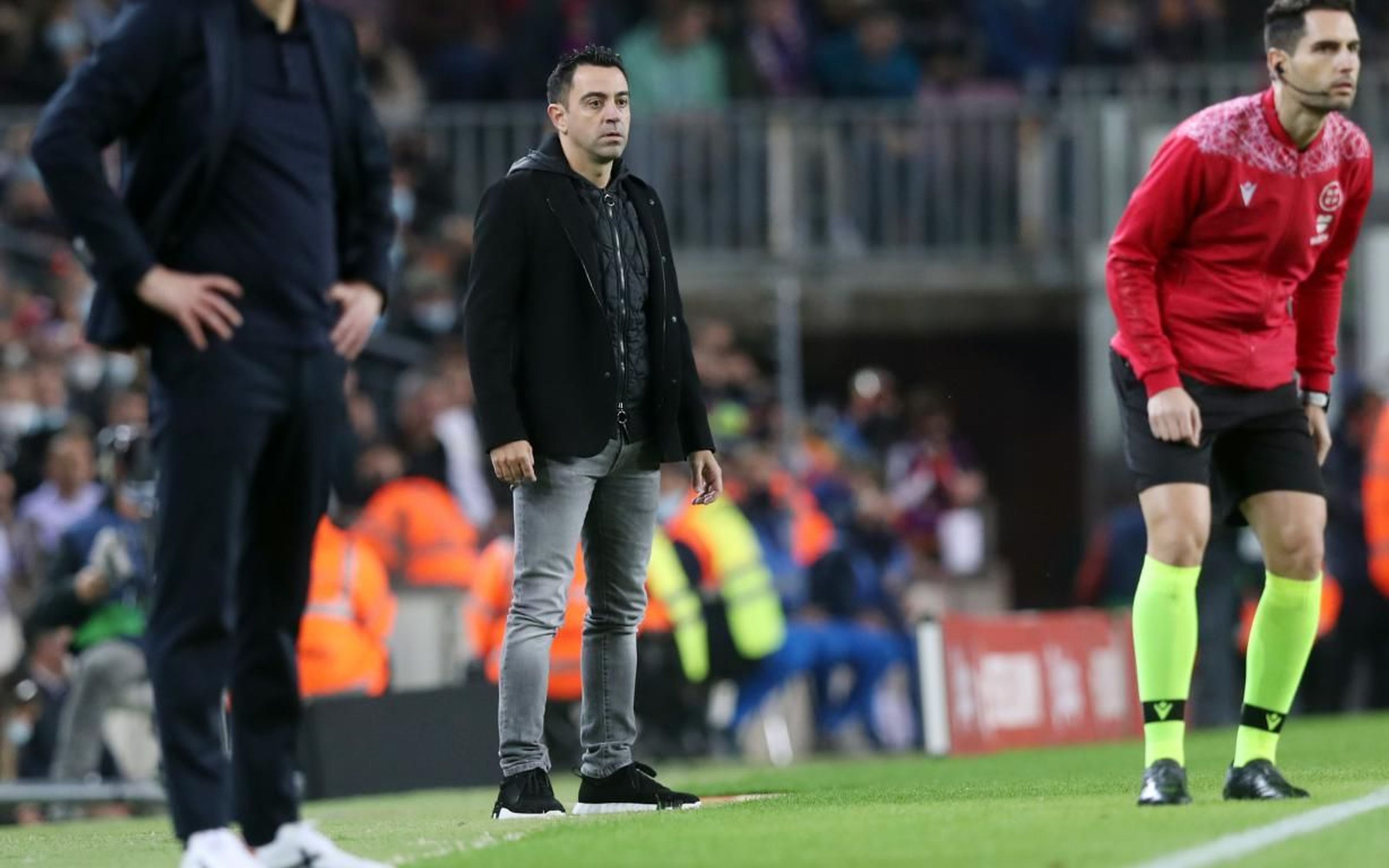Xavi's debut as coach in photos