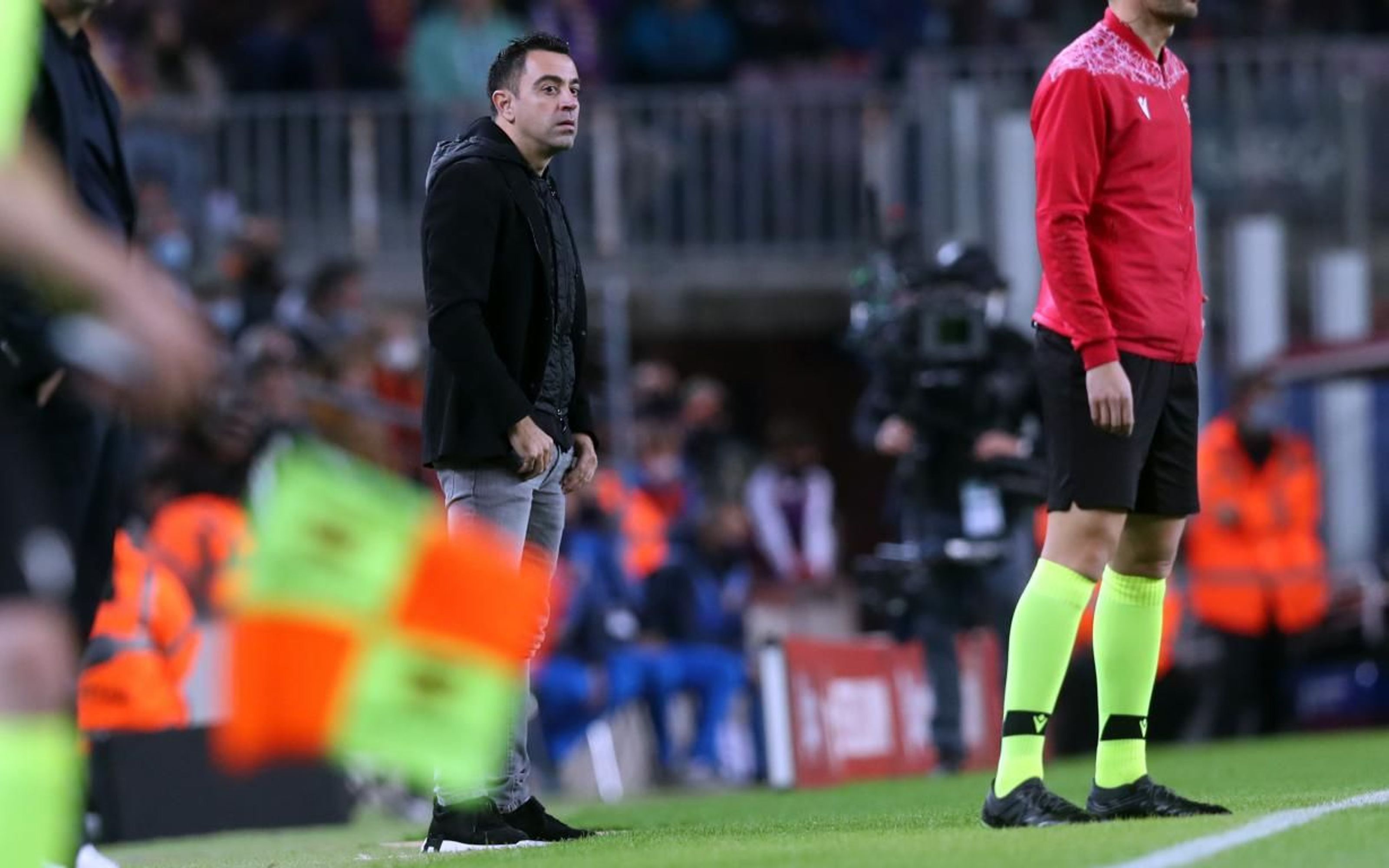 Xavi's debut as coach in photos