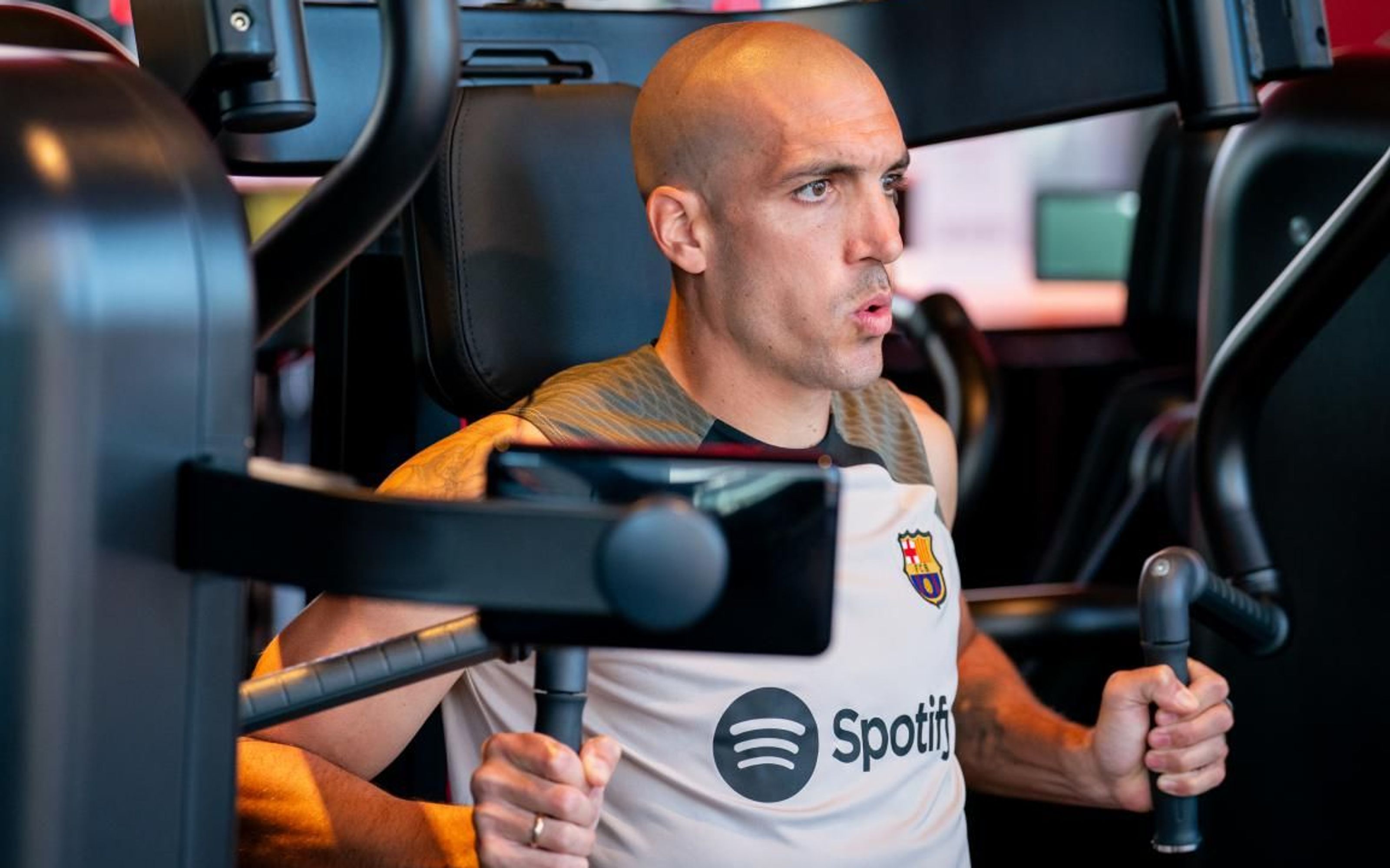 Players work out in gym at team hotel