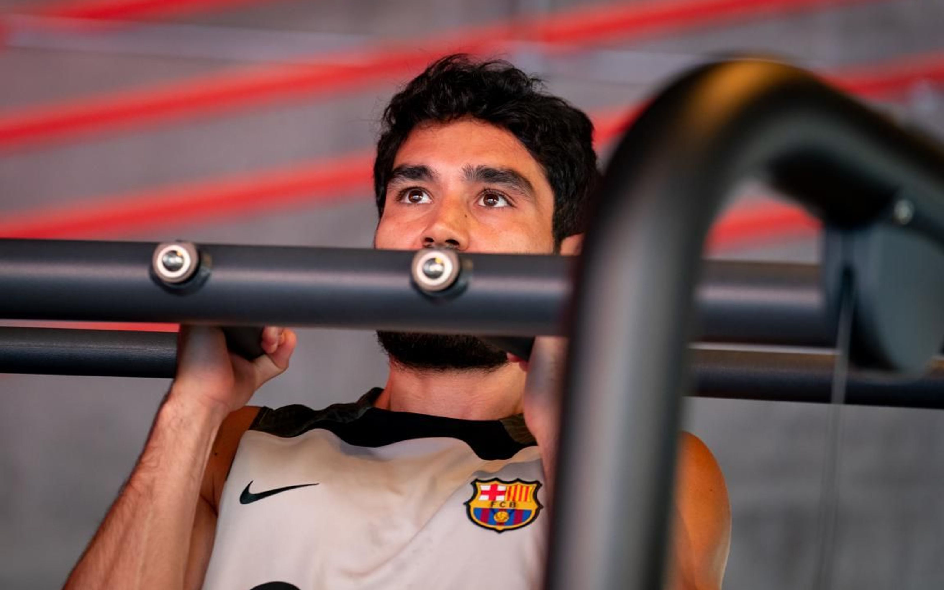 Players work out in gym at team hotel